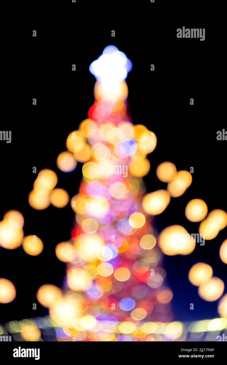 New Year's Christmas tree decorated with luminous multi-colored ...