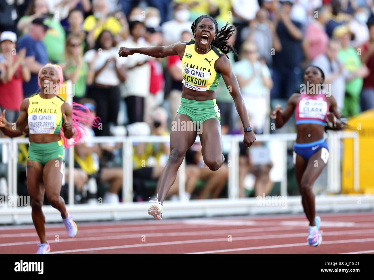 Shericka Jackson (C) of Jamaica celebrates after winning gold in the ...