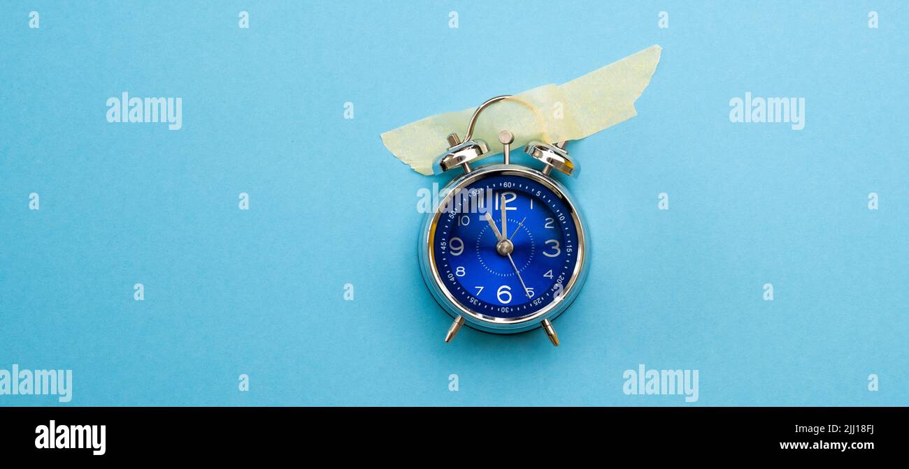 Clock with masking tape Stock Photo - Alamy