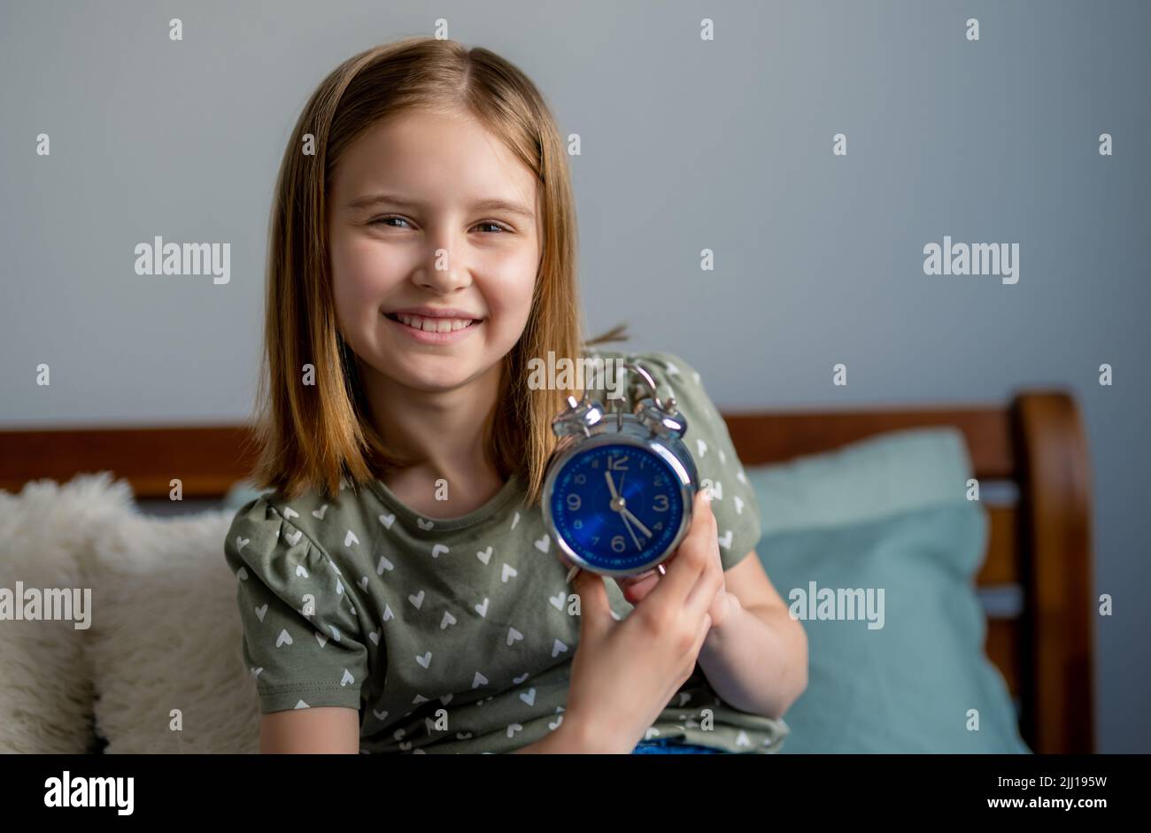 Portrait of preteen girl indoors Stock Photo - Alamy
