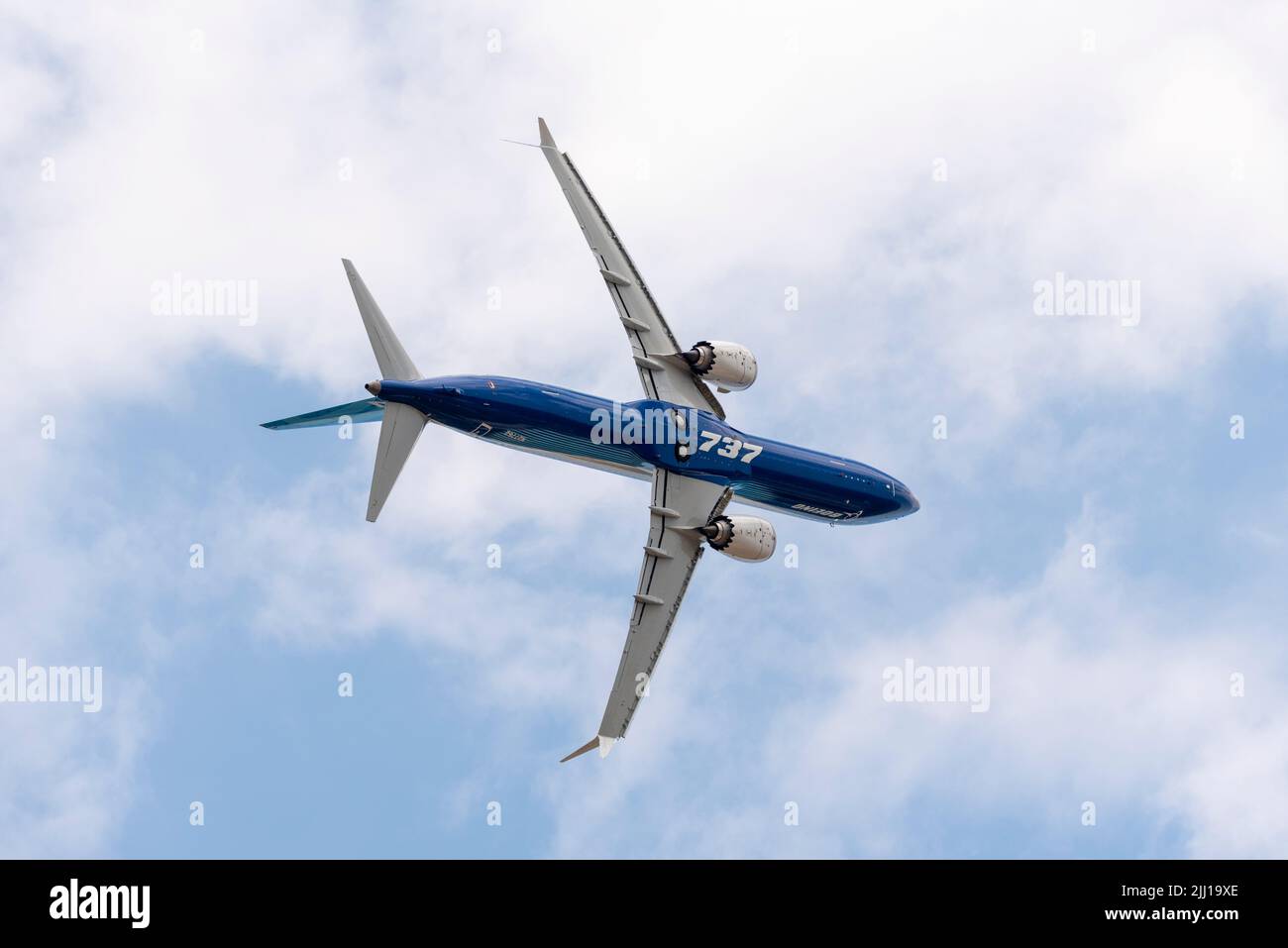 Boeing 737 MAX 10 airliner jet plane banking round whilst display ...