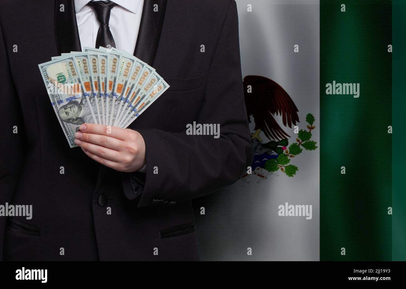 Mexican business man with 100 US dollar bills money banknotes against ...