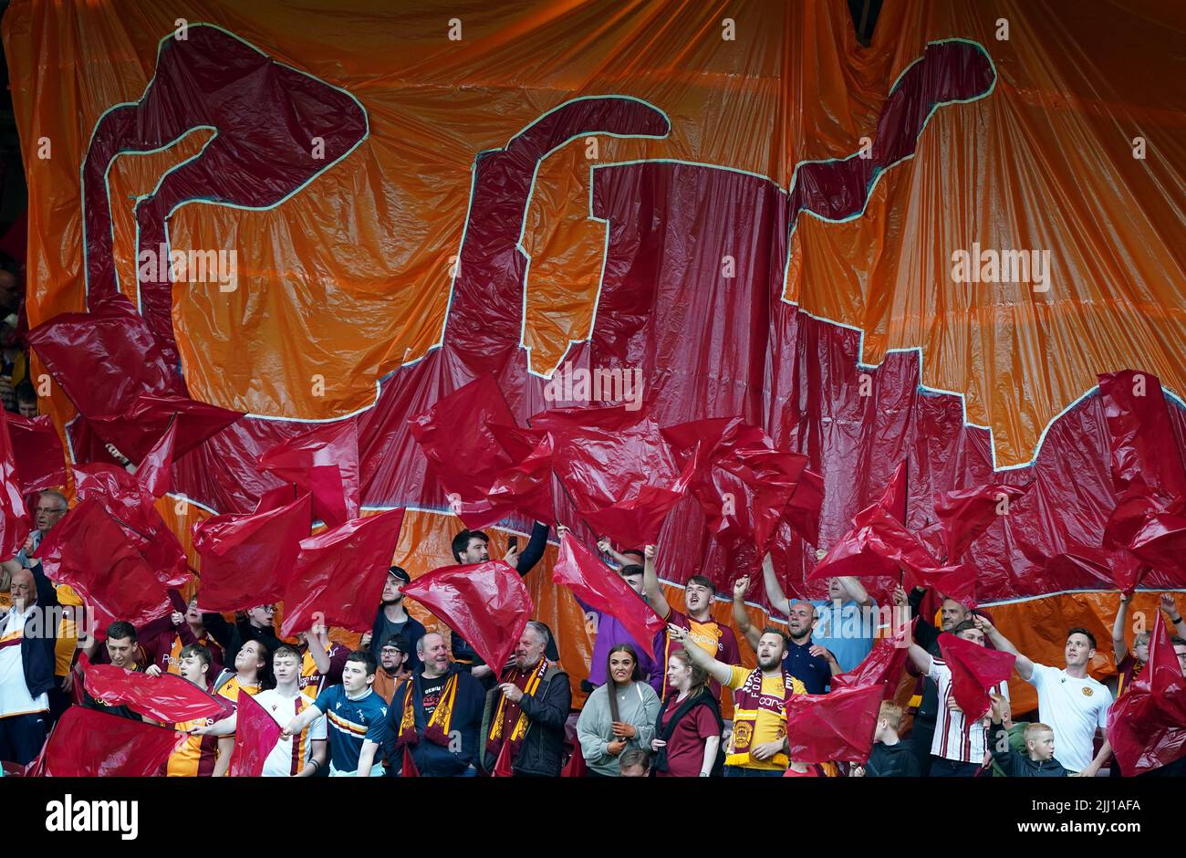 Motherwell fans wave flags to show their support before the UEFA Europa ...