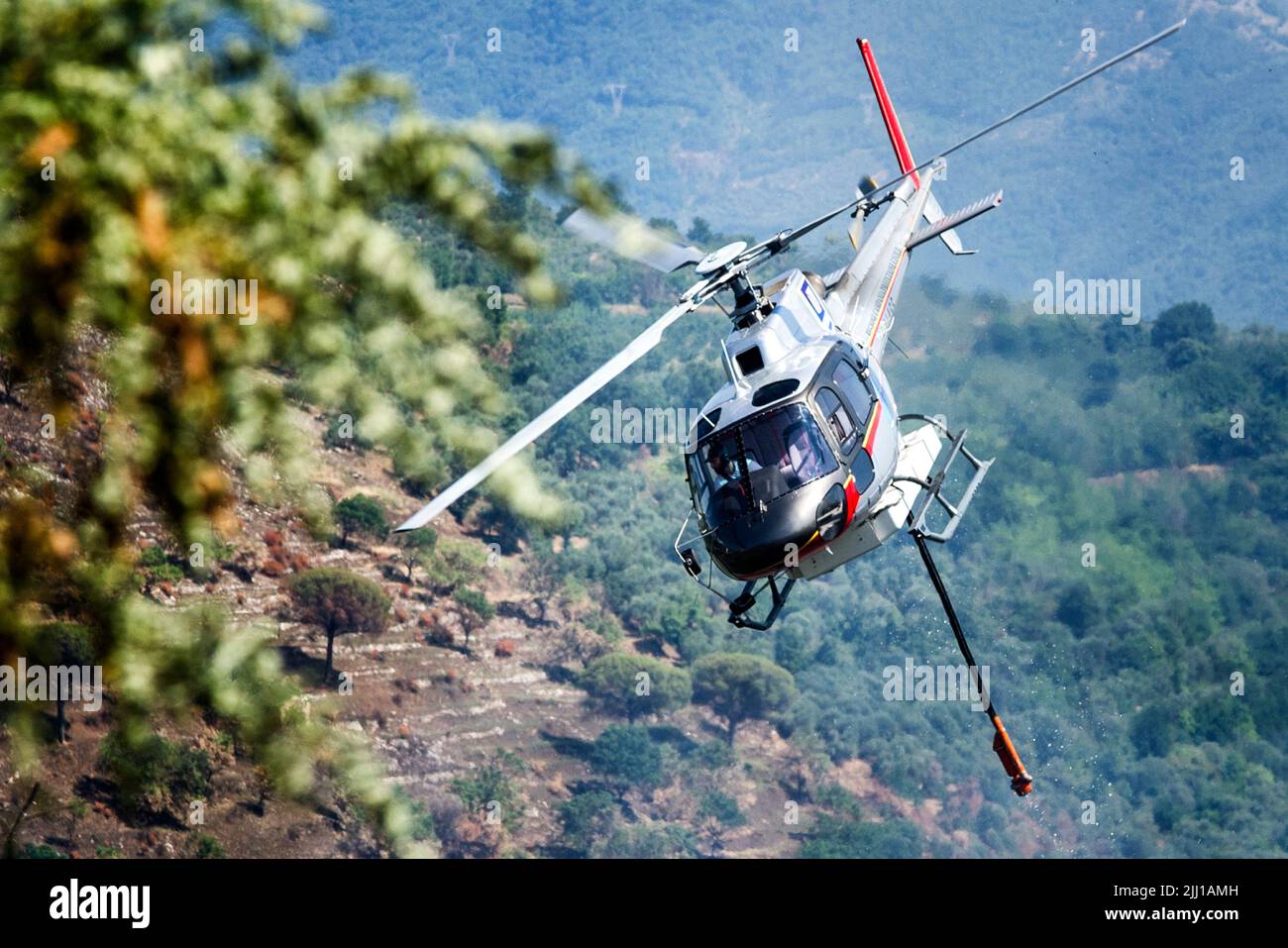 Firefighting helicopter of the Campania Region, during an intervention ...