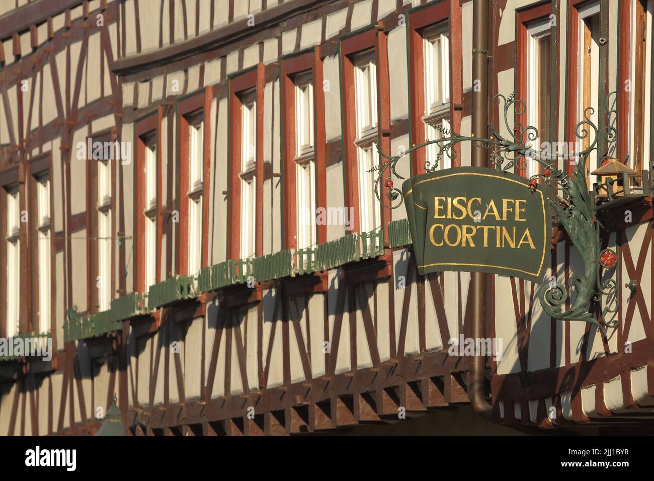 Nose sign of the half-timbered Eiscafe Cortina in Miltenberg, Bavaria ...