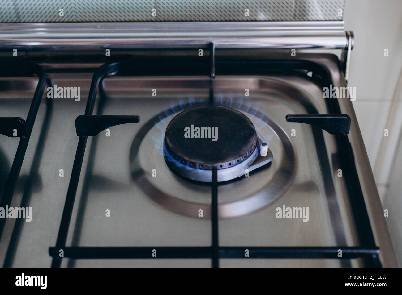 Kitchen gas hob, stove cook with blue flames burning Stock Photo - Alamy