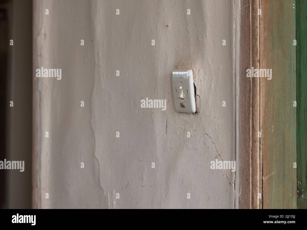 Selective focus shot of light switch used in old style country house on ...