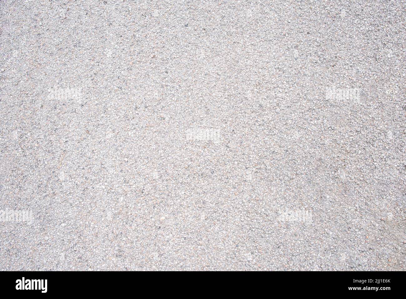 Granular soil texture with gravel particles, small stones, black, gray ...