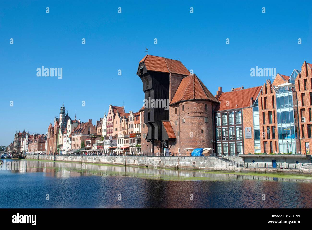 Famous crane gate and other buildings on Motlawa river embankment ...