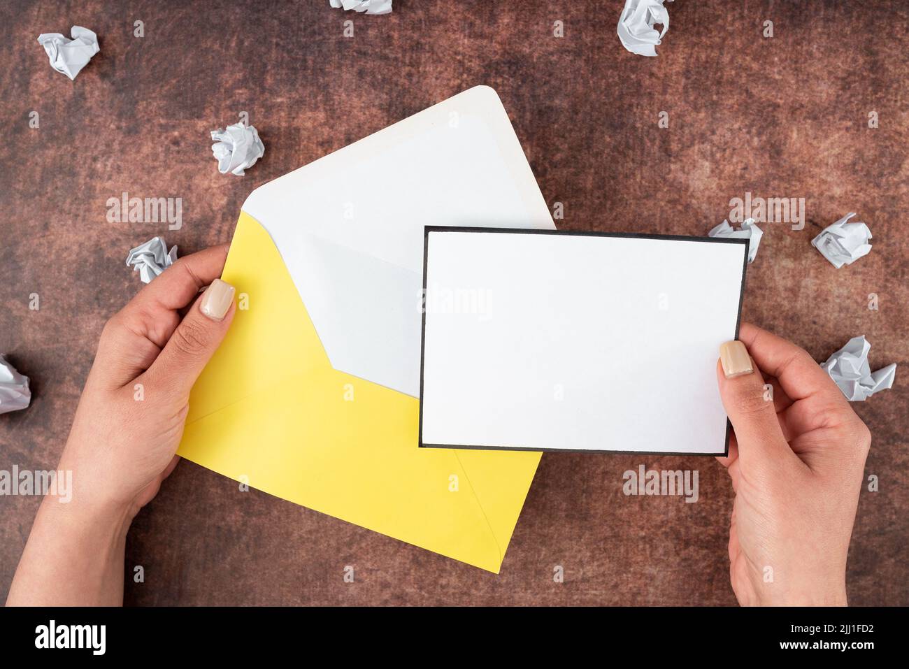 Hands Of Businesswoman Holding Blank Sheet And Envelope Surrounded With ...