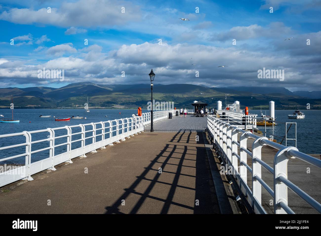 Early evening on the pier at Beaumaris, Anglesey, Wales, UK Stock Photo ...