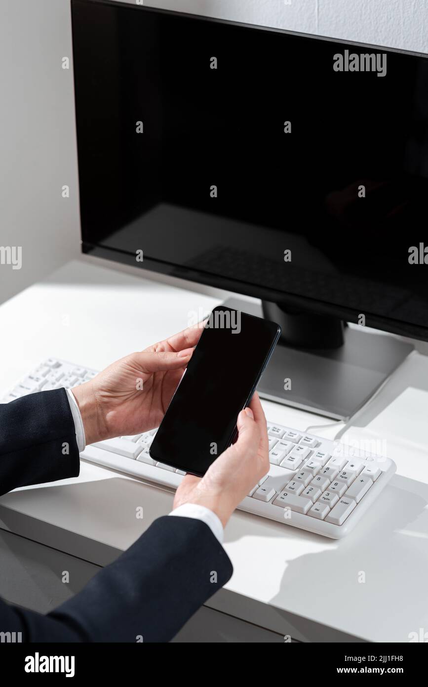 Businesswoman Holding Mobile Phone With Important Announcements Sitting ...