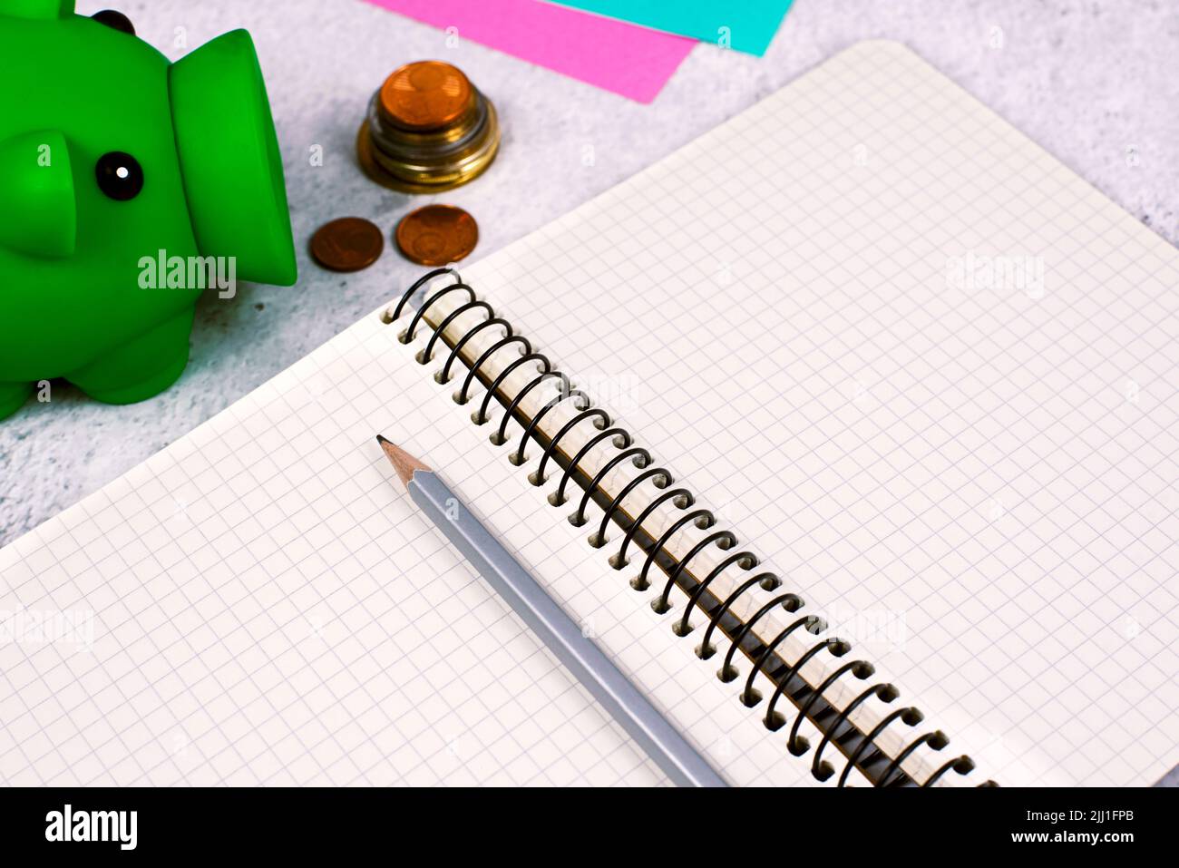 Important Message On Notebook On Desk With Money, Pen, Notes And Pig ...