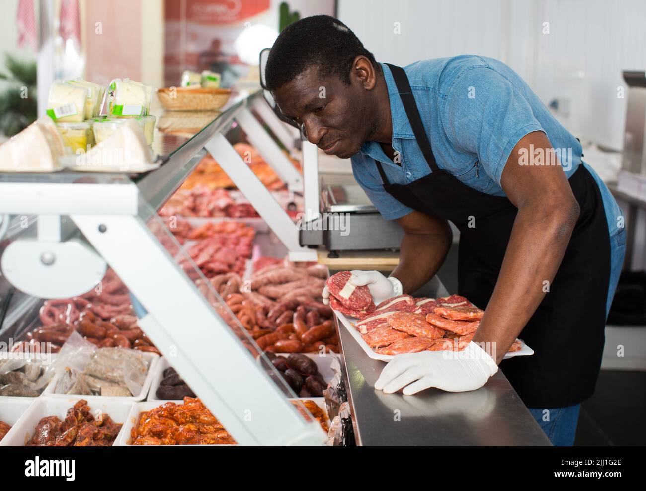 Preparing beef for sale hi-res stock photography and images - Alamy