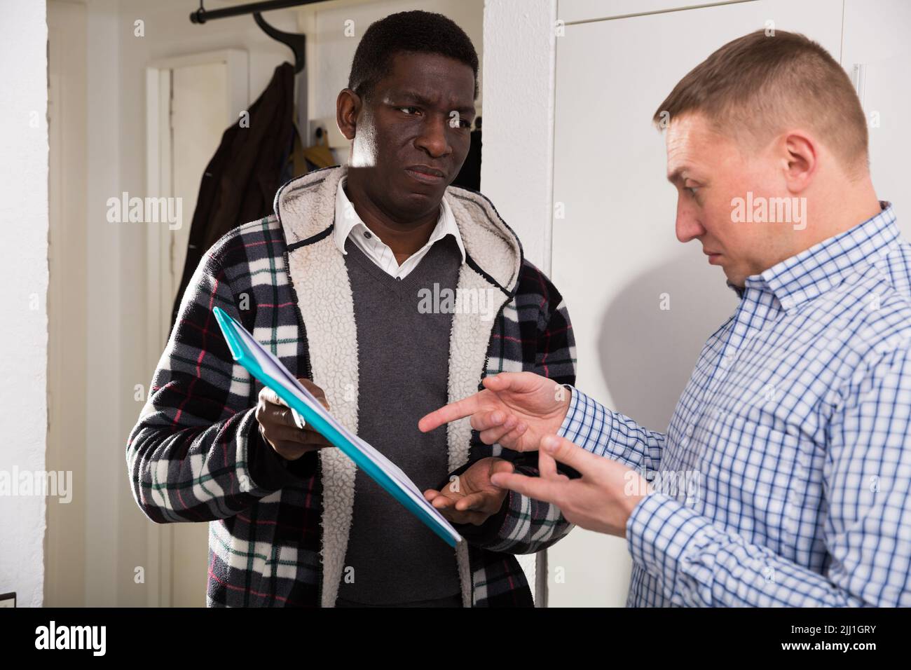 Doorstep interview hi-res stock photography and images - Alamy