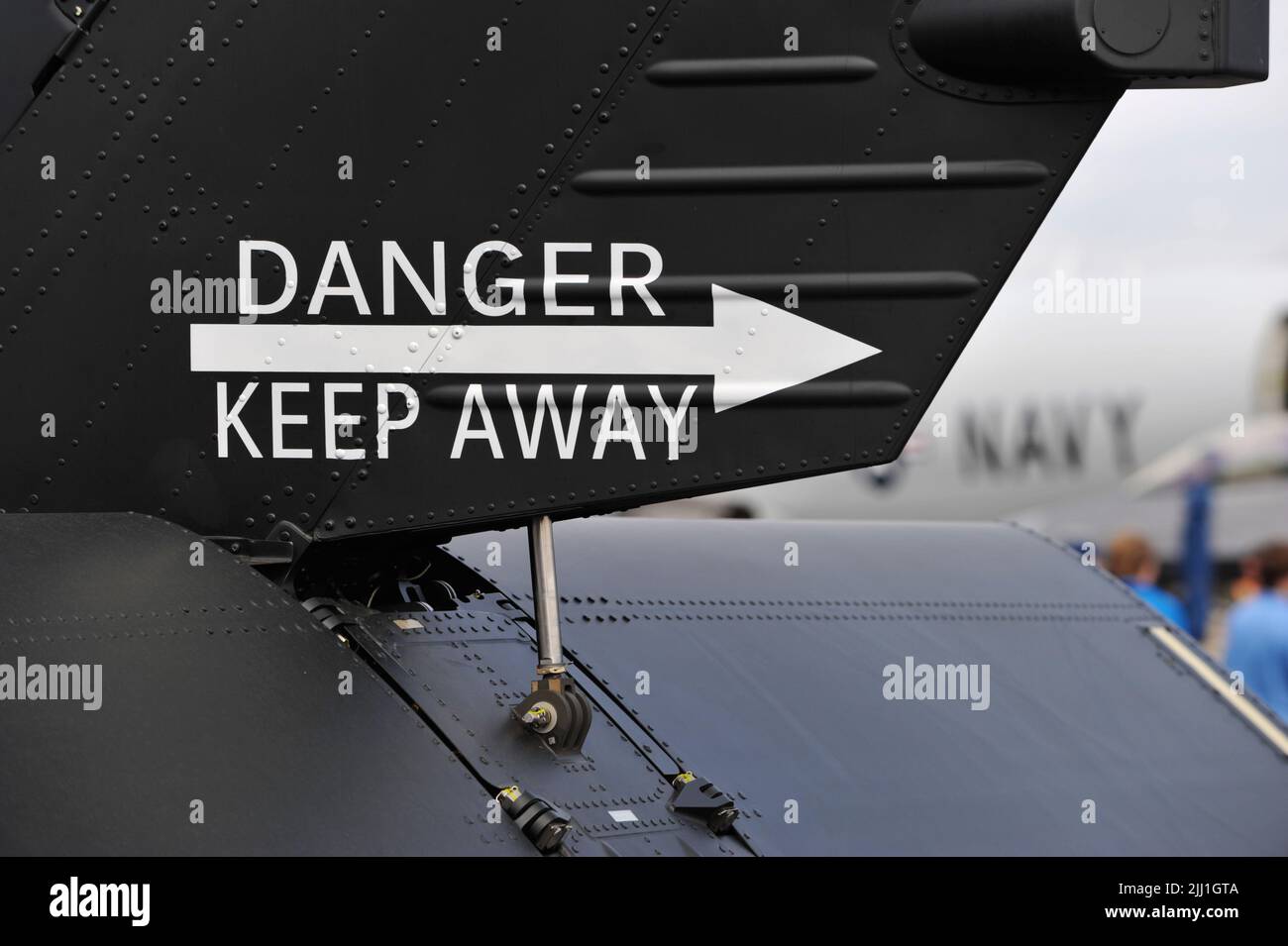 A rotor warning sign on the tail plane of a United Rotorcraft S-70 ...