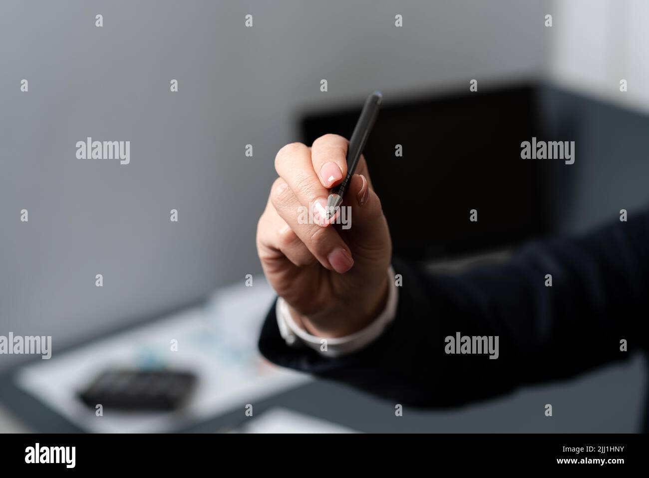 Businesswoman Holding Pen And Pointing On Important Messages. Woman In ...