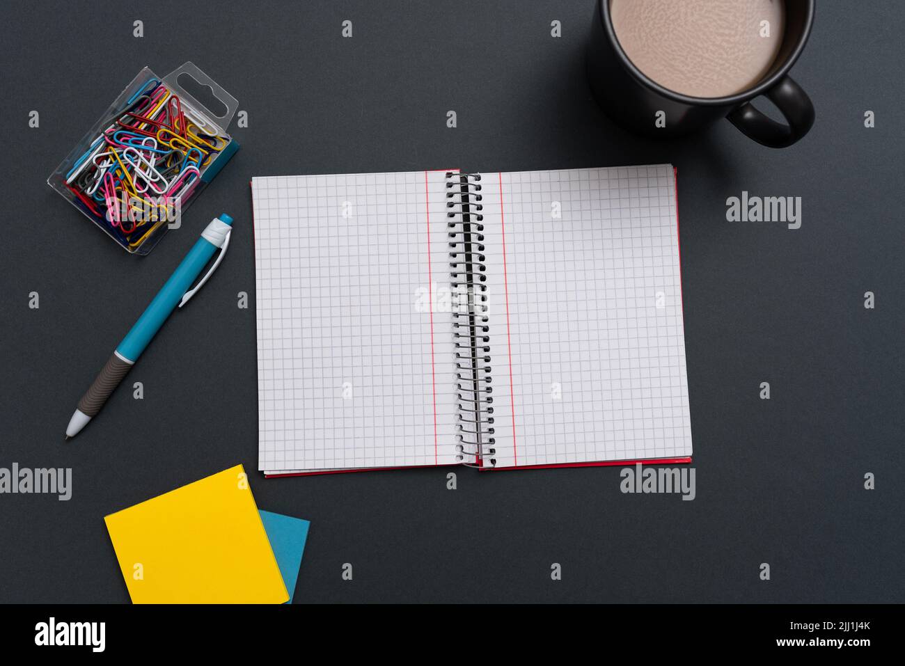 Notebook With Important Messages On Both Sides On Desk With Coffee, Pen ...
