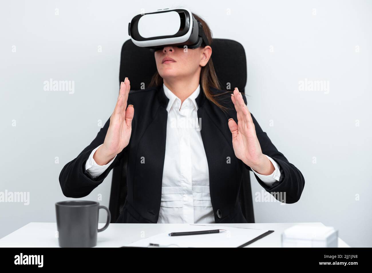 Female Executive Gesturing While Learning Professional Skill Through ...