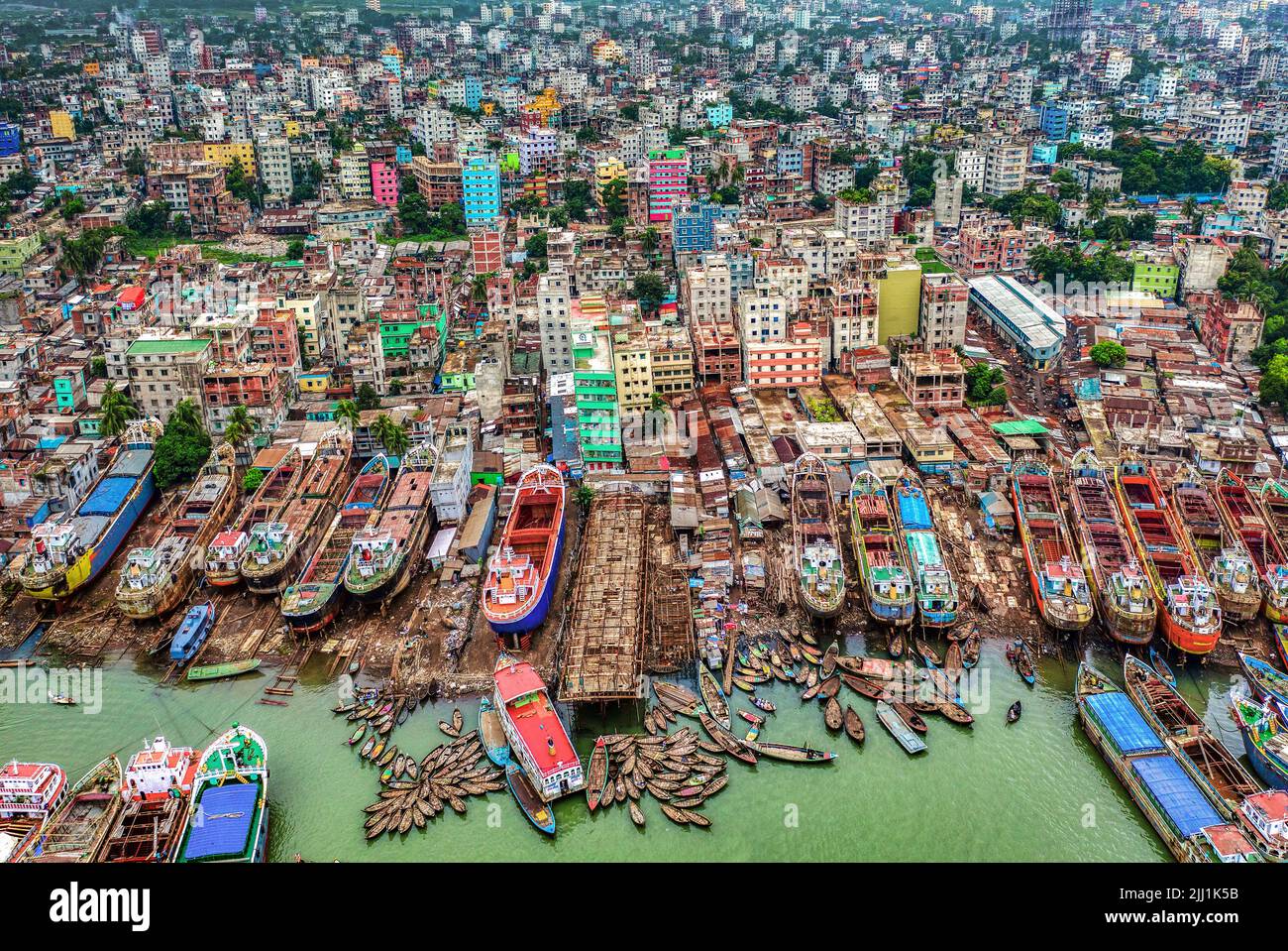 Aerial view Sadarghat Dhaka shipyard with container vessel, barges ...