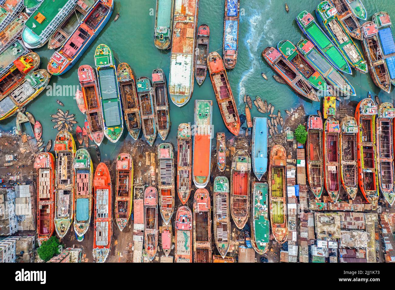 Aerial view Sadarghat Dhaka shipyard with container vessel, barges ...