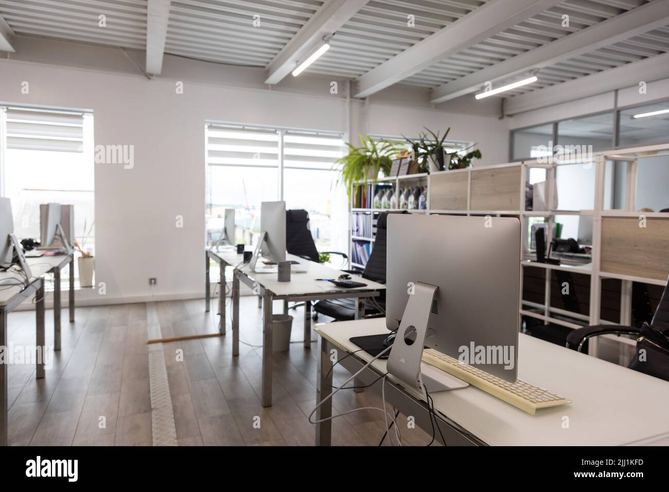 Interior of a modern light small company office. Workspace, office ...