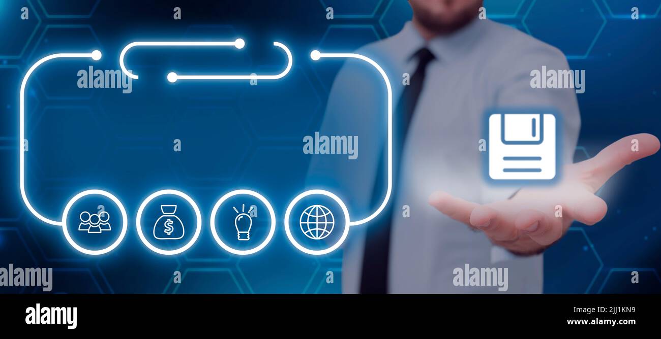 Businessman With Hand Reaching Out A Floppy Disk And Glowing Digital ...