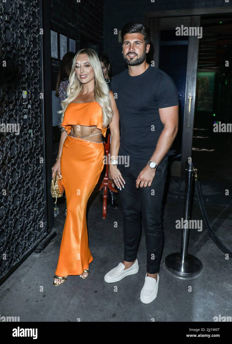 (L-R) Amber Turner and Dan Edgar seen attending the ITV Summer Party ...