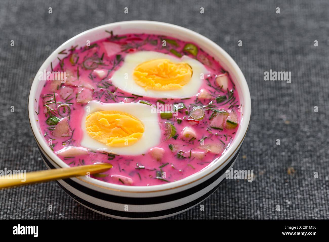 Cold beetroot soup with eggs and fresh vegetables. Popular Polish and ...