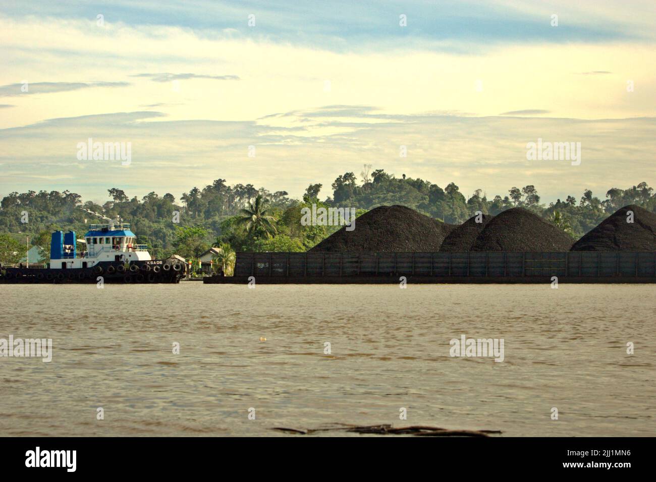 Coal barge on Segah River in Tanjung Redeb, Berau, East Kalimantan ...