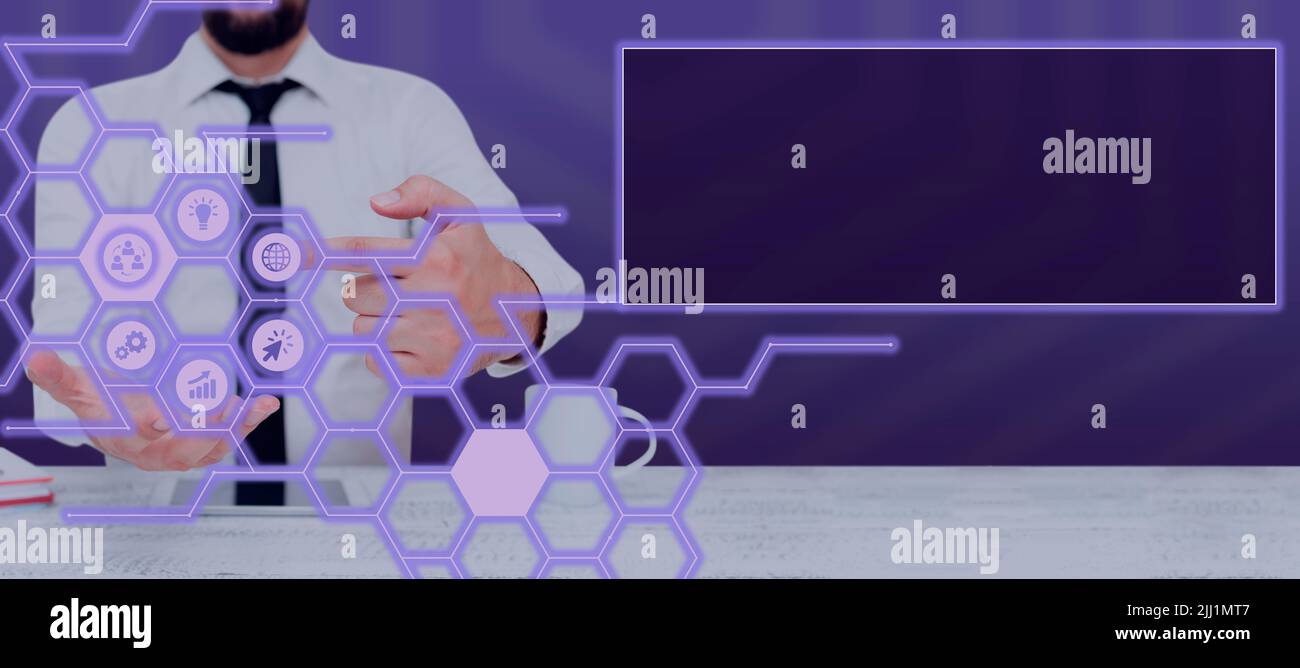 Businessman With A Touch Screen Displaying Digital Symbols In A Glowing ...