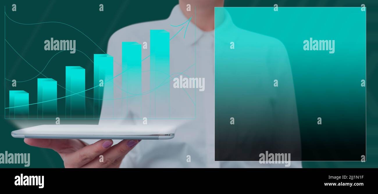 Businesswoman Holding Tablet Presenting Digitally Generated Bar Graph ...