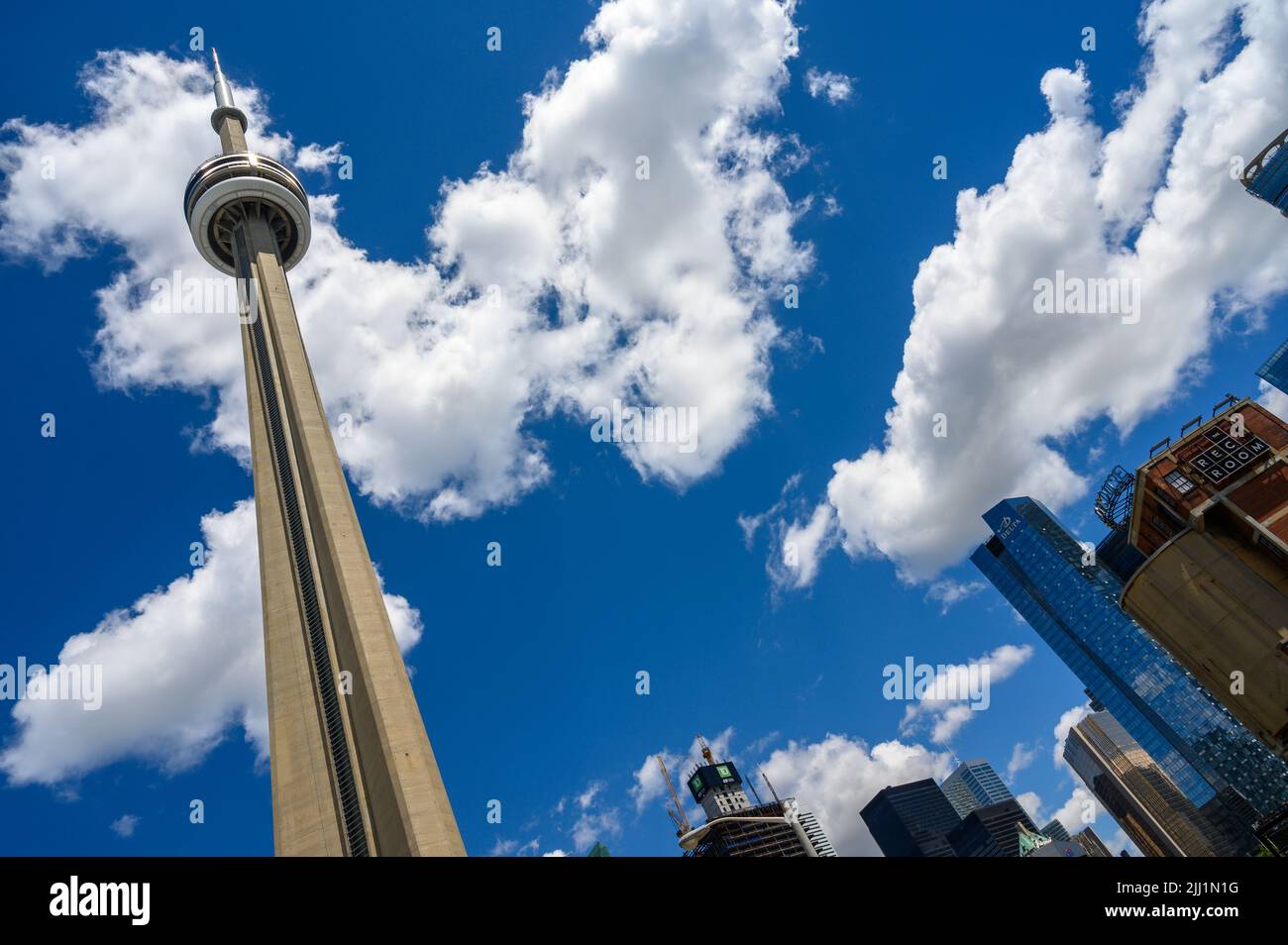 Looking up at the impressive CN Tower from ground level near Rogers ...