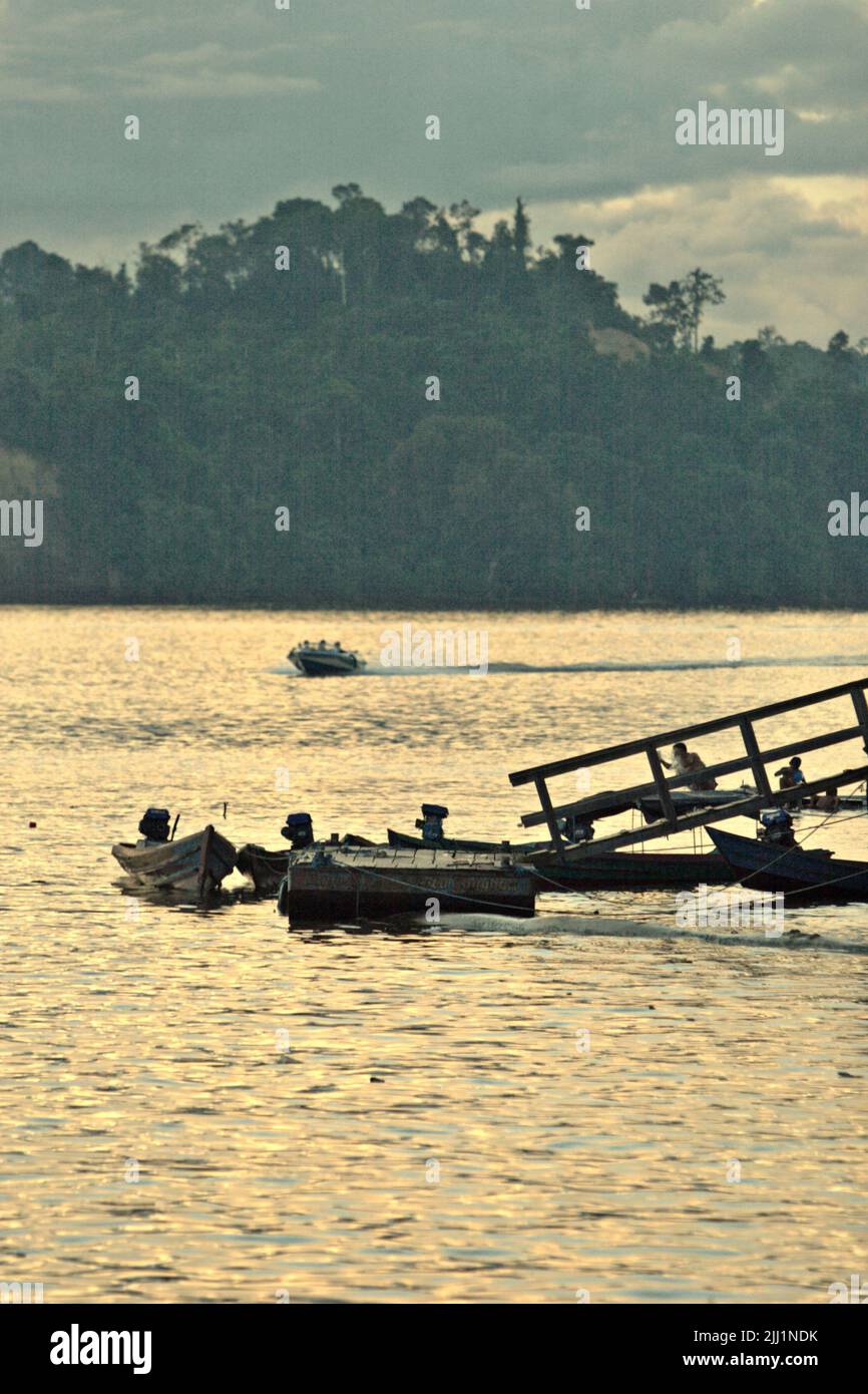 A boat jetty on Segah river in Tanjung Redeb, Berau, East Kalimantan ...