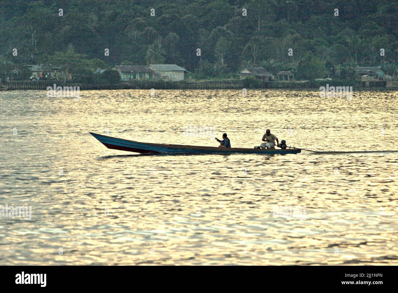 Motorized longboat hi-res stock photography and images - Alamy