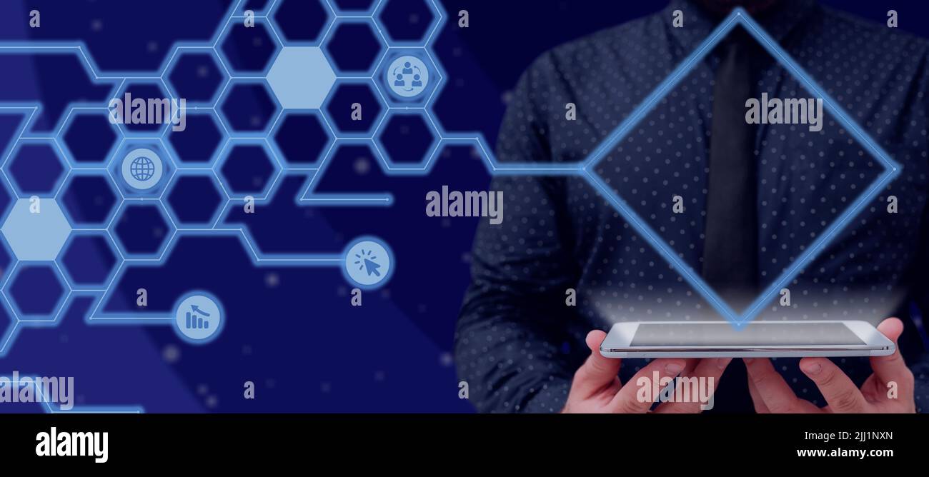 Businessman Holding A Tablet With Two Hands Showing Digital Symbols In A Glowing Hexagon Pattern ...