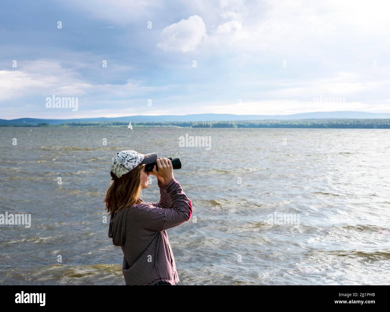 Birdwatching birdwatcher female girl woman hi-res stock photography and ...