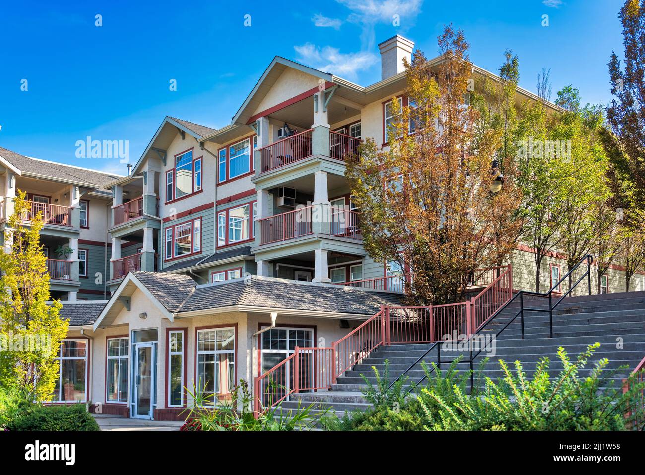Low-rise residential building with stairs on the side through the land ...