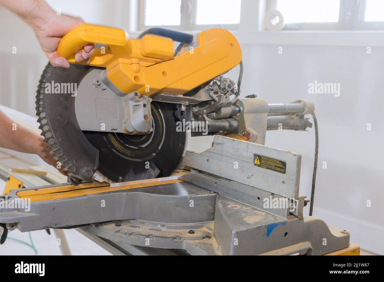 In order to finish the wood moldings and baseboard, a construction ...