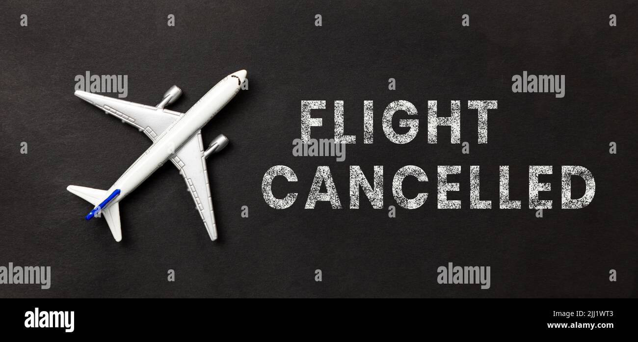 A white plane flight on a black background with text 'flight cancelled ...