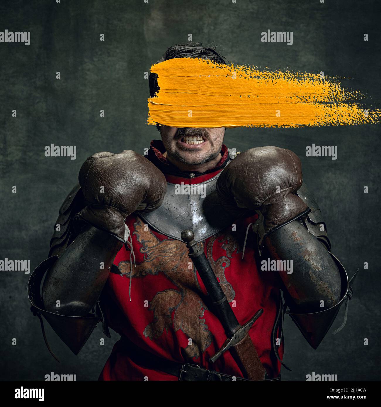 Artwork. Young man as medieval warrior, knight isolated on dark vintage ...