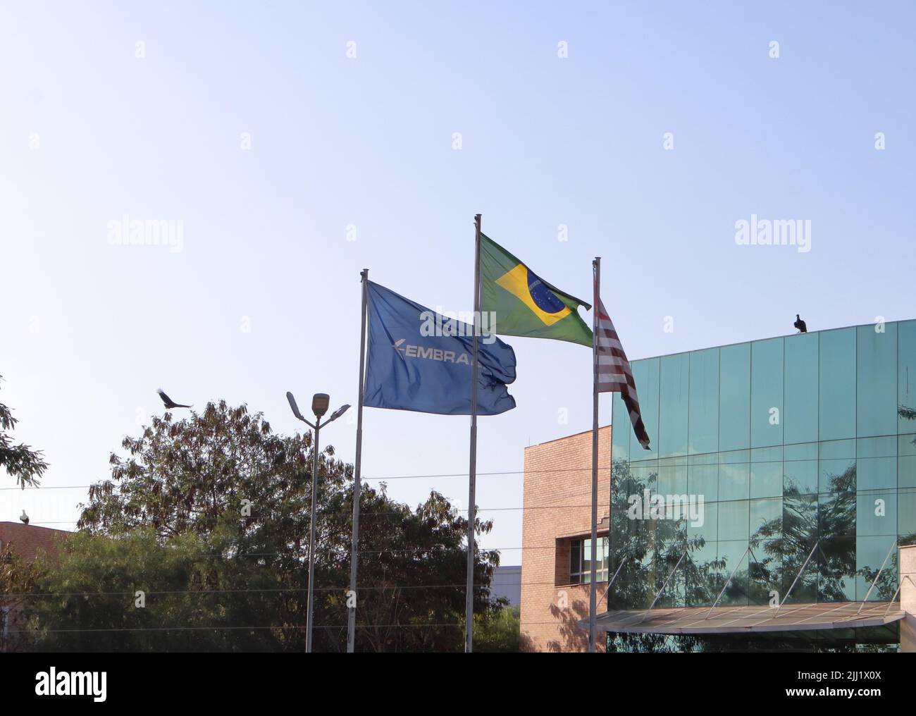 Taubate, Sao Paulo, Brazil - July 15, 2022: Embraer flag in front of ...