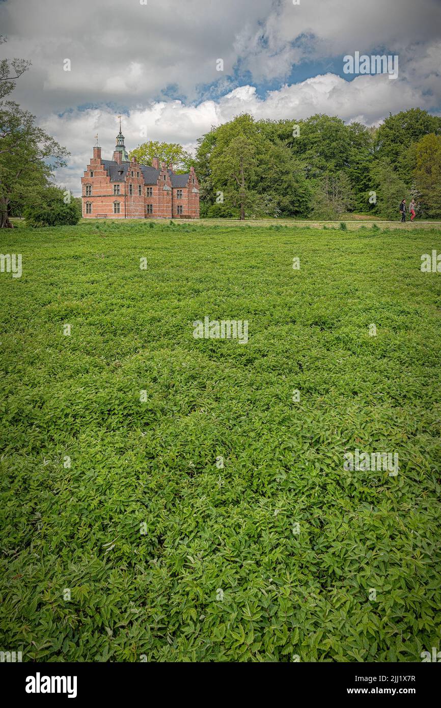 A vertical shot of Frederiksborg Castle, Hillerod, Denmark on the ...