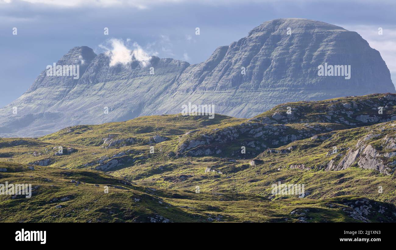 A beautiful view of the Suilven and a brooding sky, the Highlands of ...