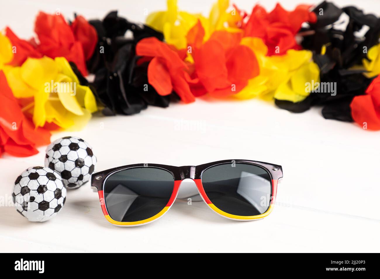 The German party decorations with Hawaii chain, sunglasses and balls ...
