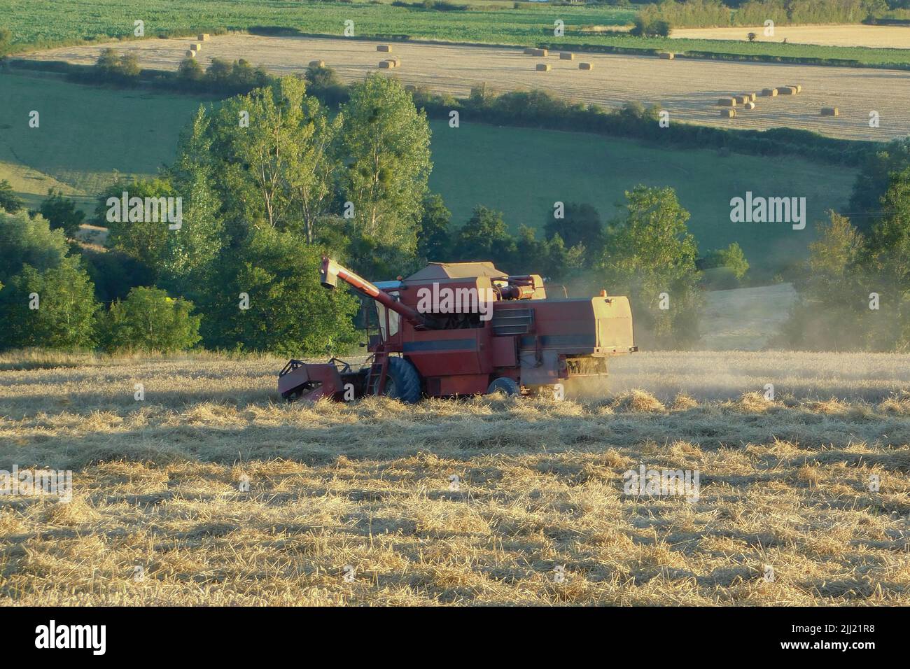 Red combine harvester hi-res stock photography and images - Alamy