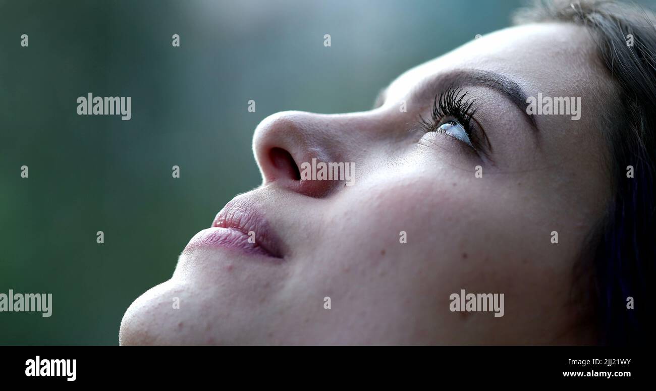 Woman face closing eyes in contemplation, girl opening eyes with faith ...