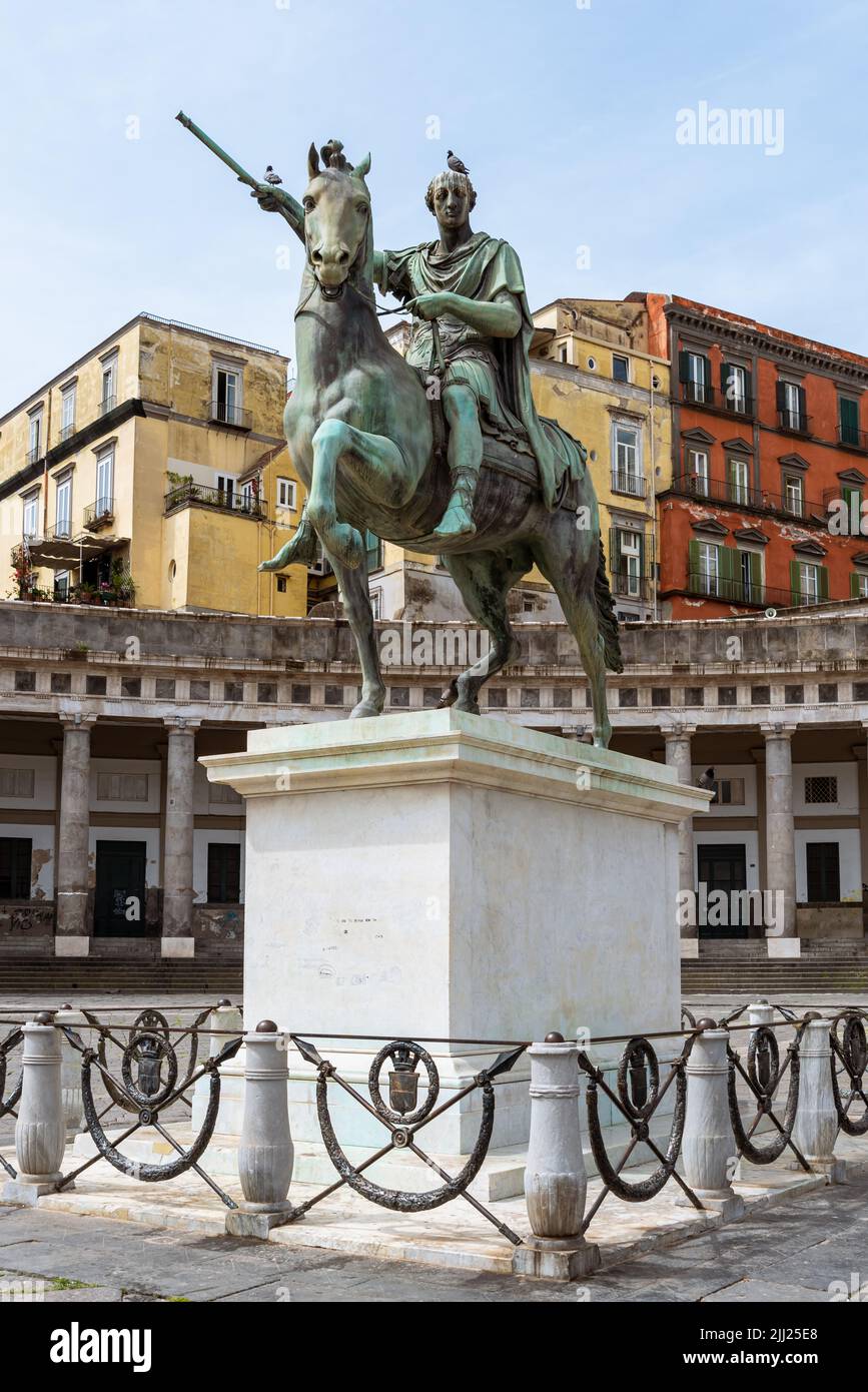 Bronze statue of man riding a horse in plebiscito square in Naples ...