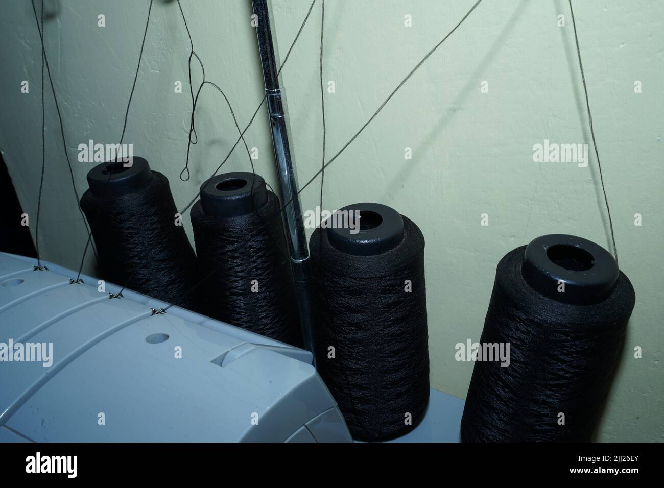 Sewing thread for overlock the side Stock Photo - Alamy