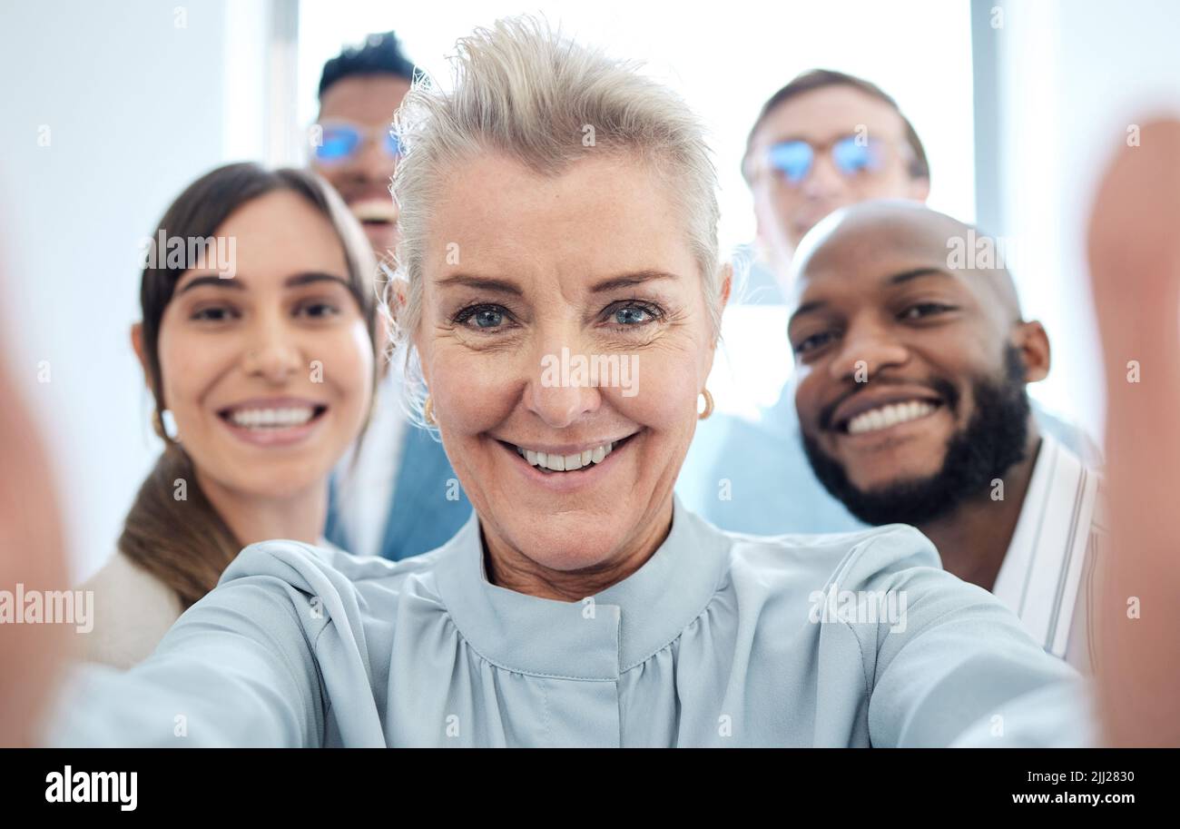 Our optimism levels are high today. Portrait of a group of confident ...